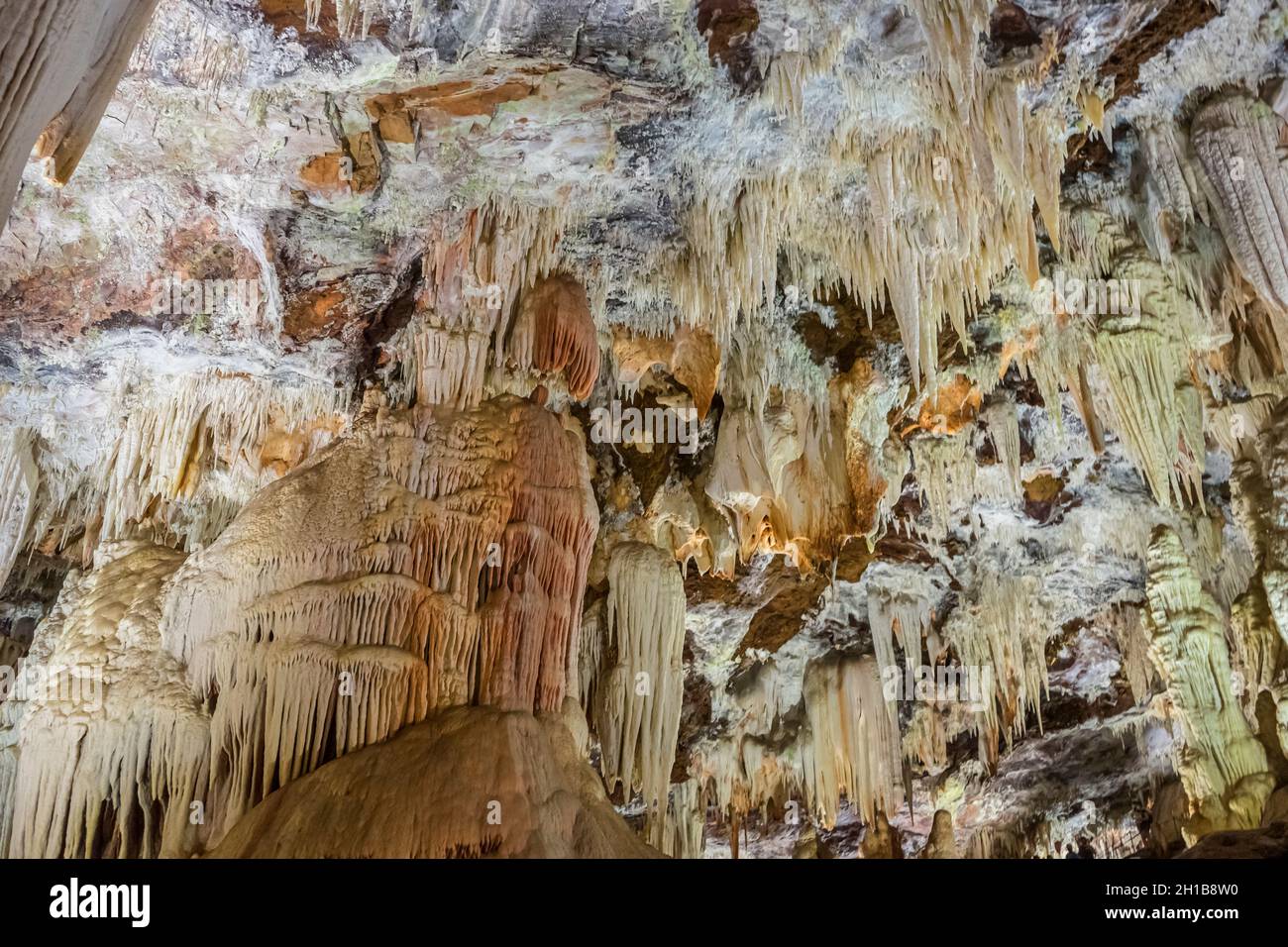 Geologic, Formation of stalactites and stalagmites inside an ancient ...