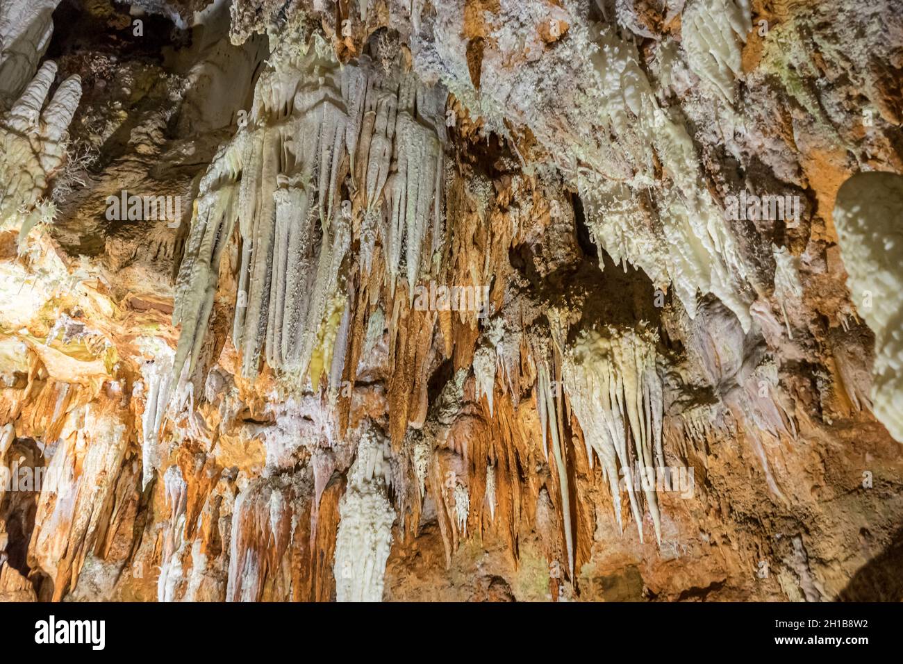 Geologic, Formation of stalactites and stalagmites inside an ancient ...