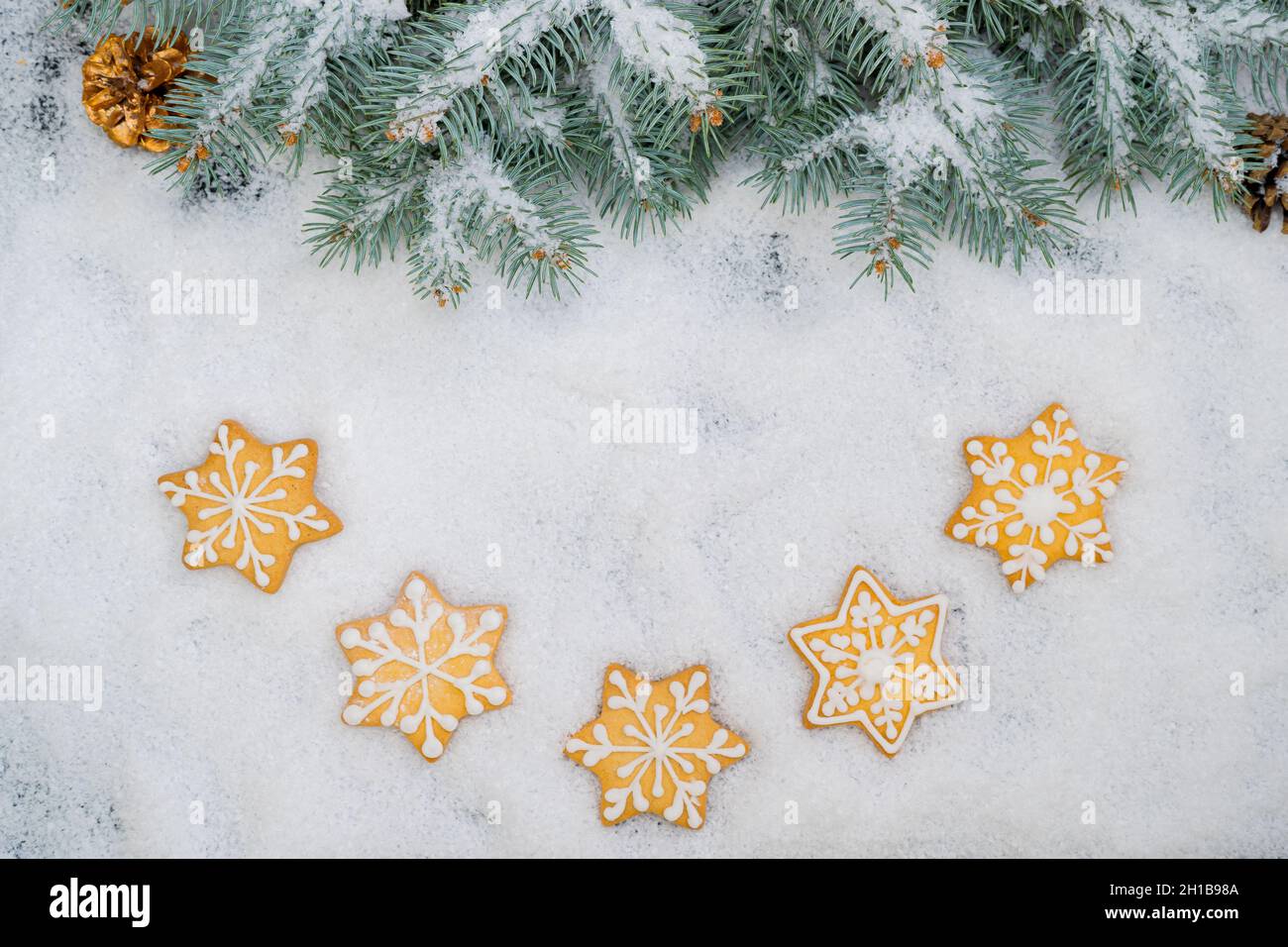Pattern of gingerbread cookies in different shapes on a dark surface ...