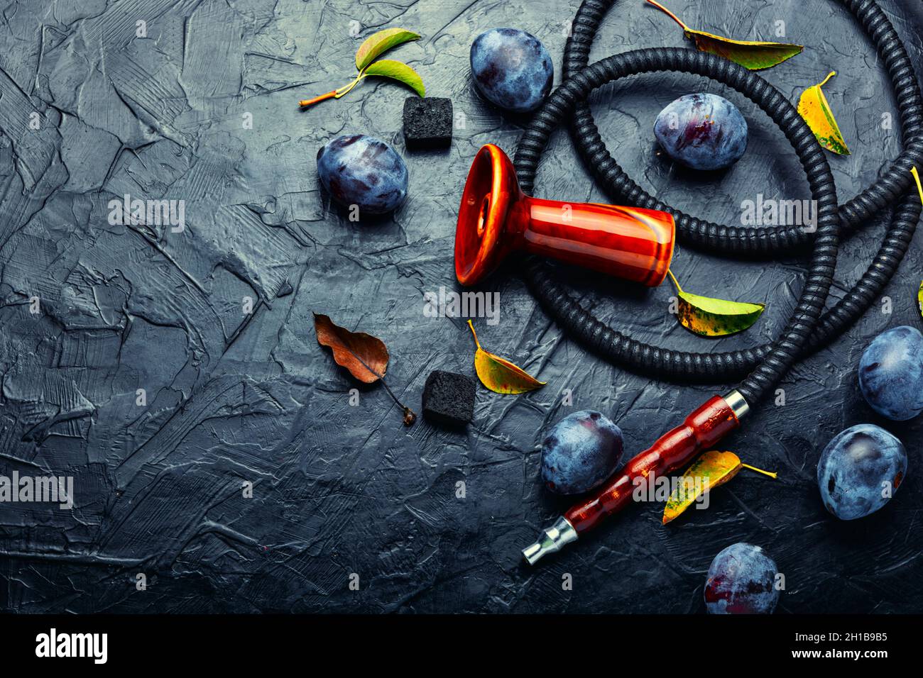 Smoking hookah with plum flavored tobacco.Fruit shisha,copy space Stock ...