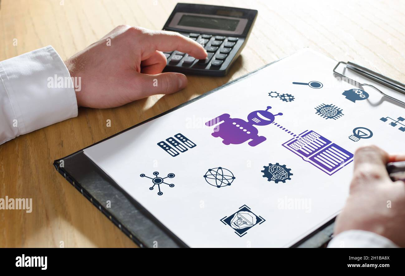 Machine learning concept with hand using a calculator Stock Photo - Alamy