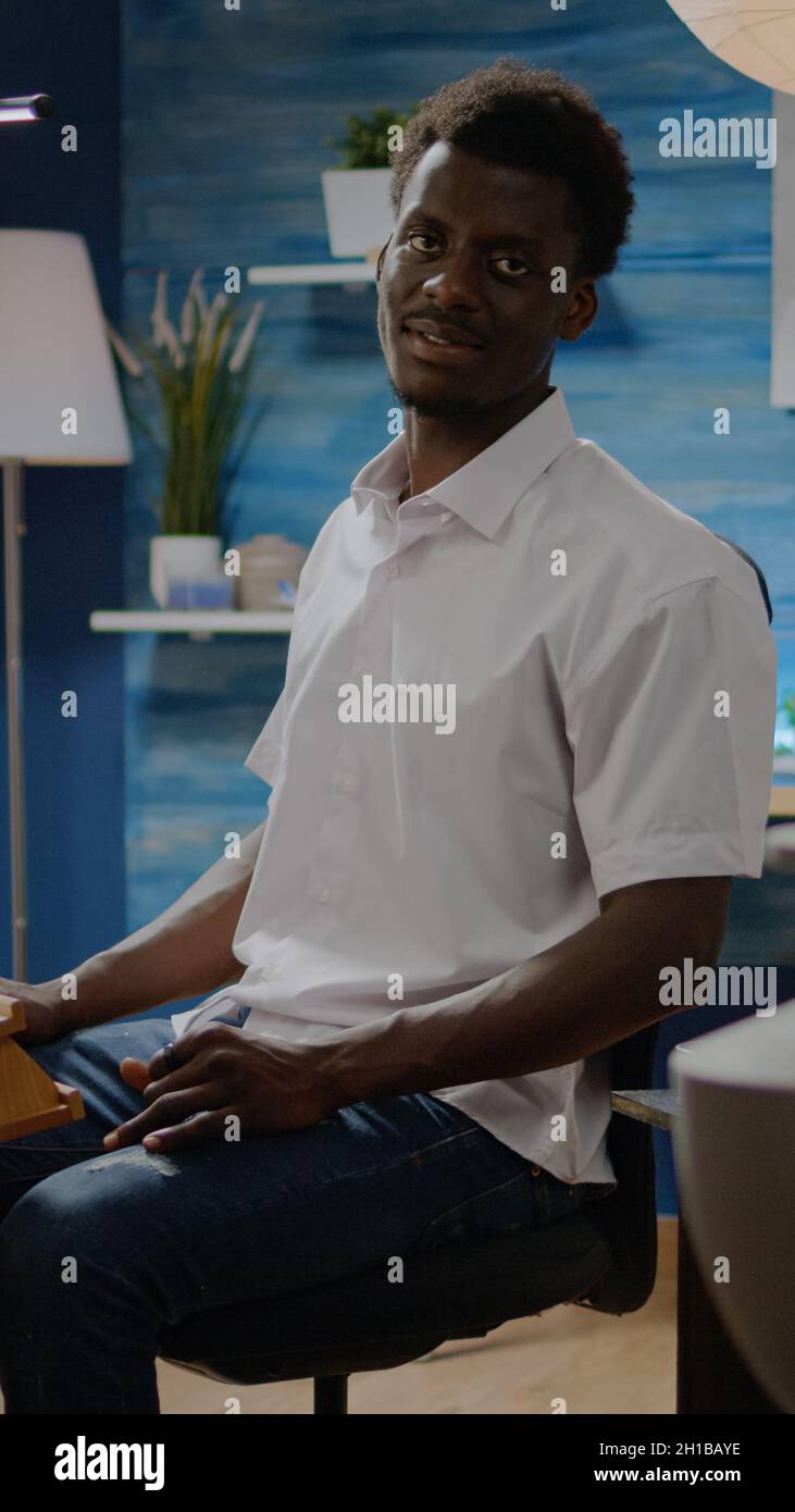 Black man in art studio preparing for creativity process designing ...