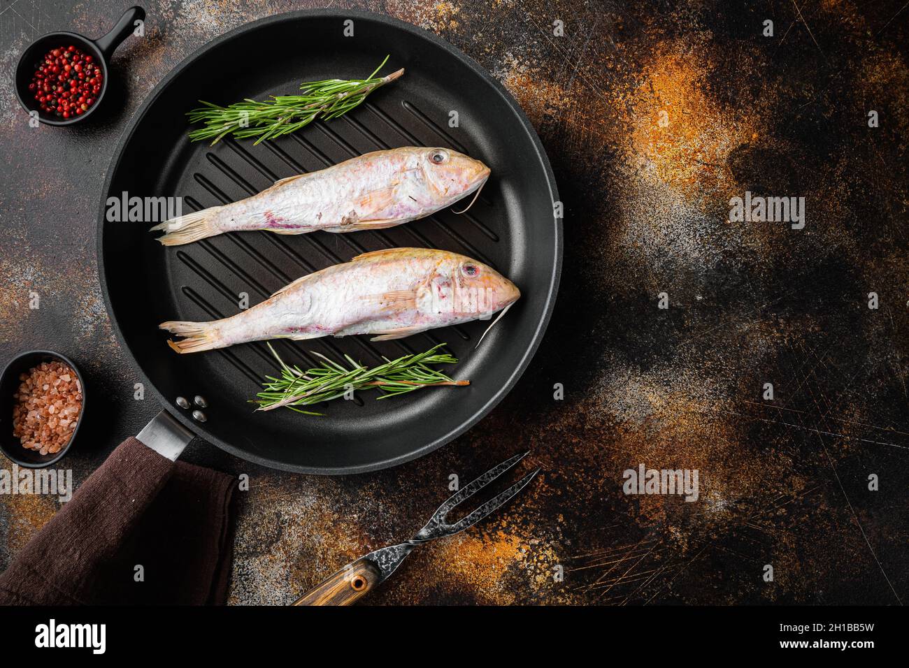 Raw fresh mullet or barabulka whole fish set, with ingredients and ...