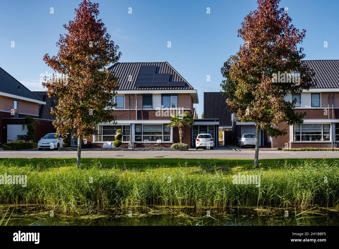 Dutch Suburban area with modern family houses, newly build modern ...