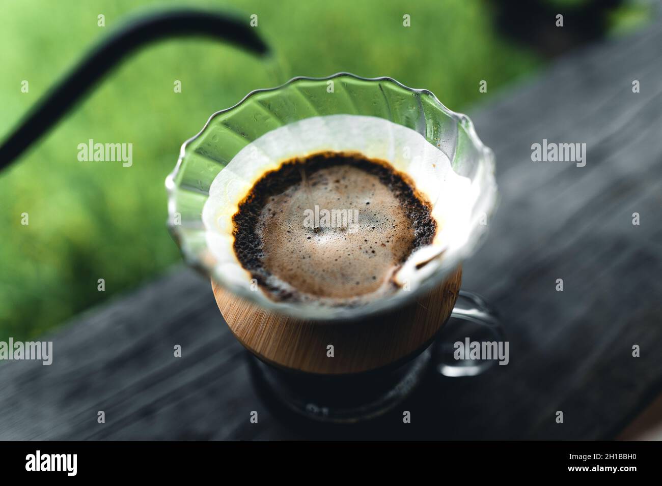 outdoor drip coffee maker on wooden table rice field background Stock ...
