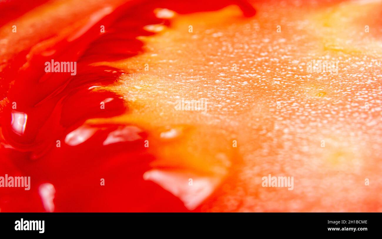 macro photo of slice of tomato. Abstract nature background Stock Photo ...