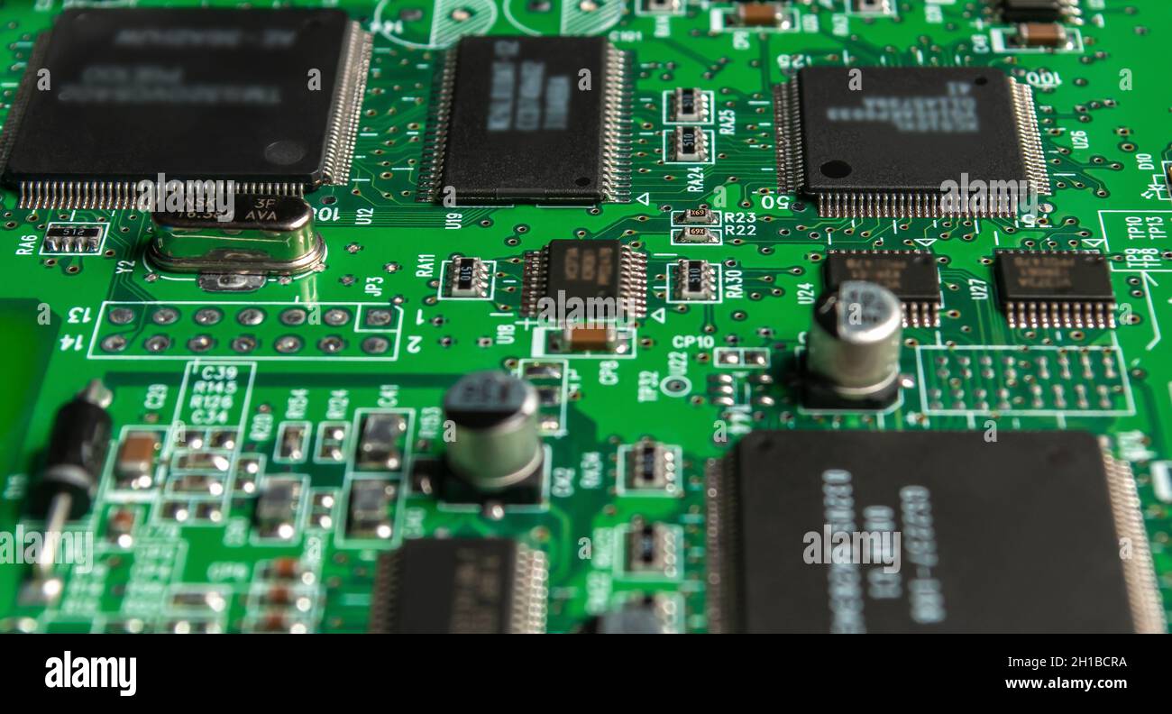 printed circuit board with surface mounted passive and active circuit components close up Stock ...