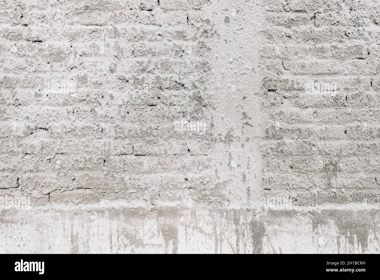 Texture of old brick wall sprayed with stucco mortar as background ...