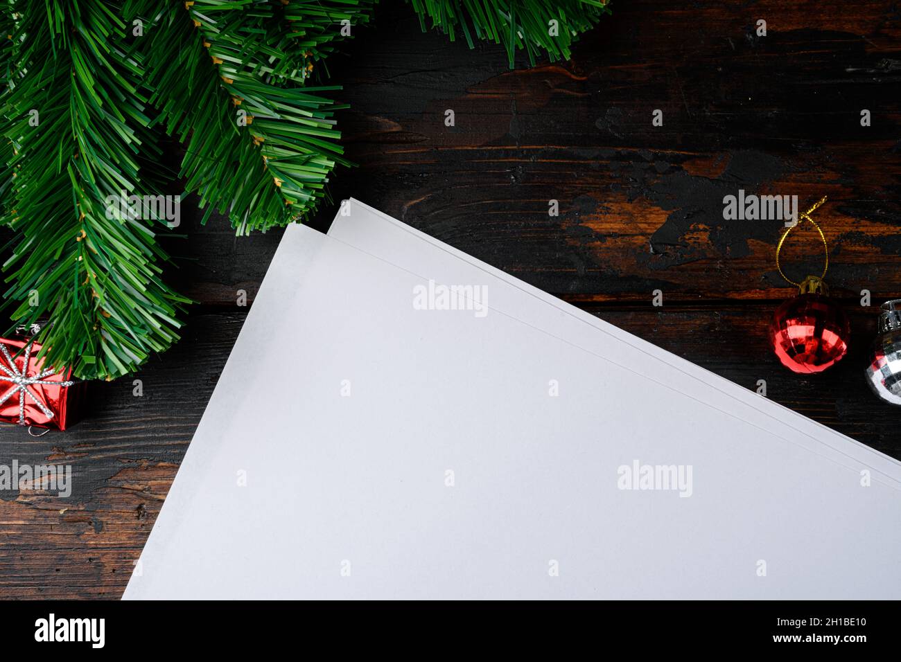 Paper with Christmas tree decoration toys set, top view flat lay , with ...