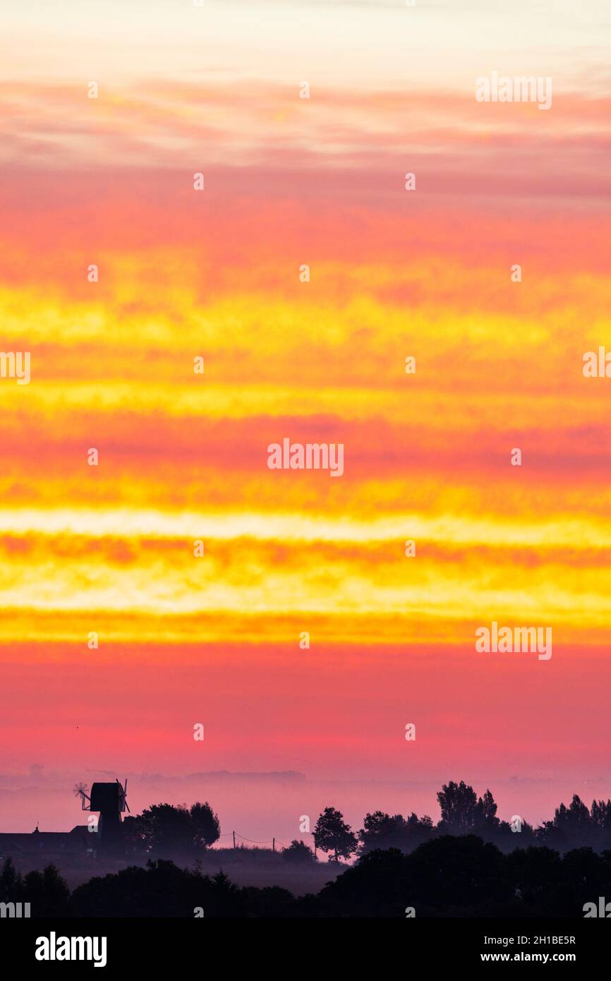 Very dramatic dawn sky over a mist covered Kent Landscape with some ...