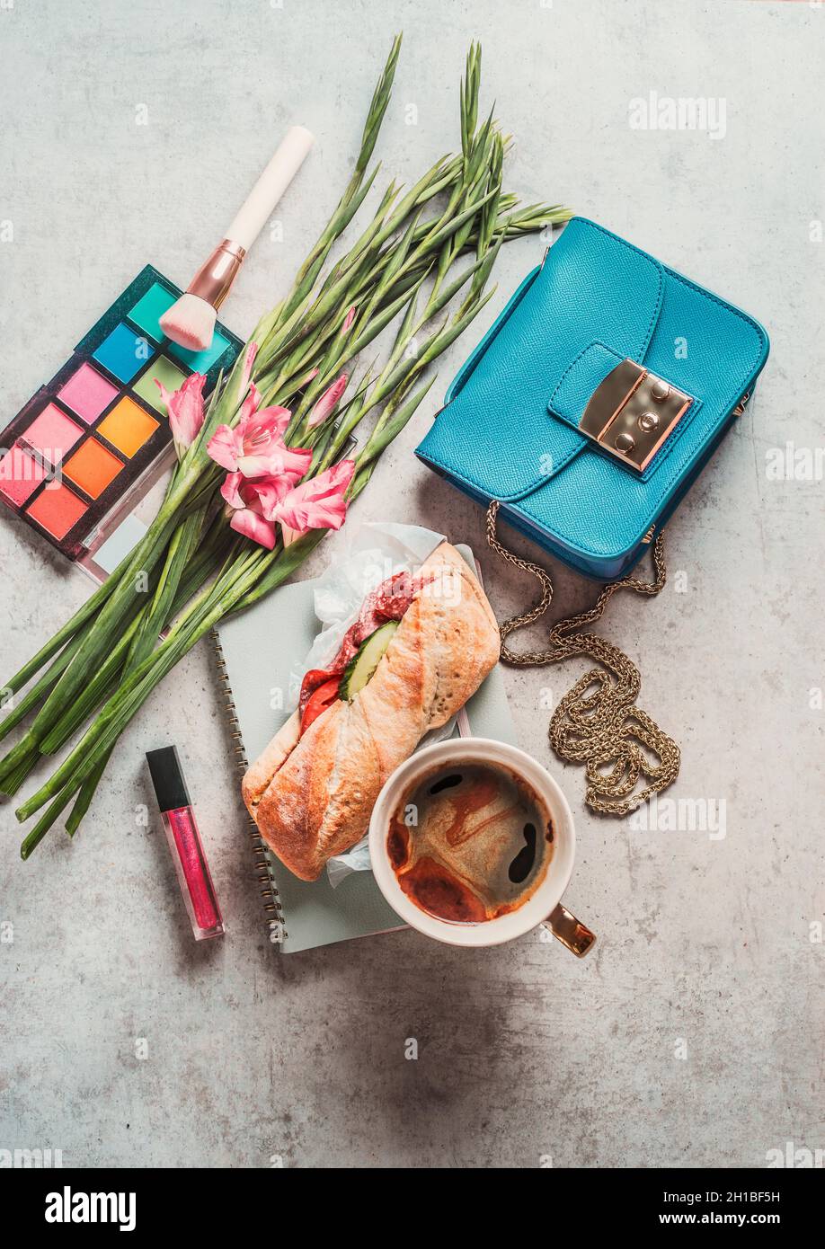 Feminine freelancer lunch or breakfast with healthy sandwich, coffee ...