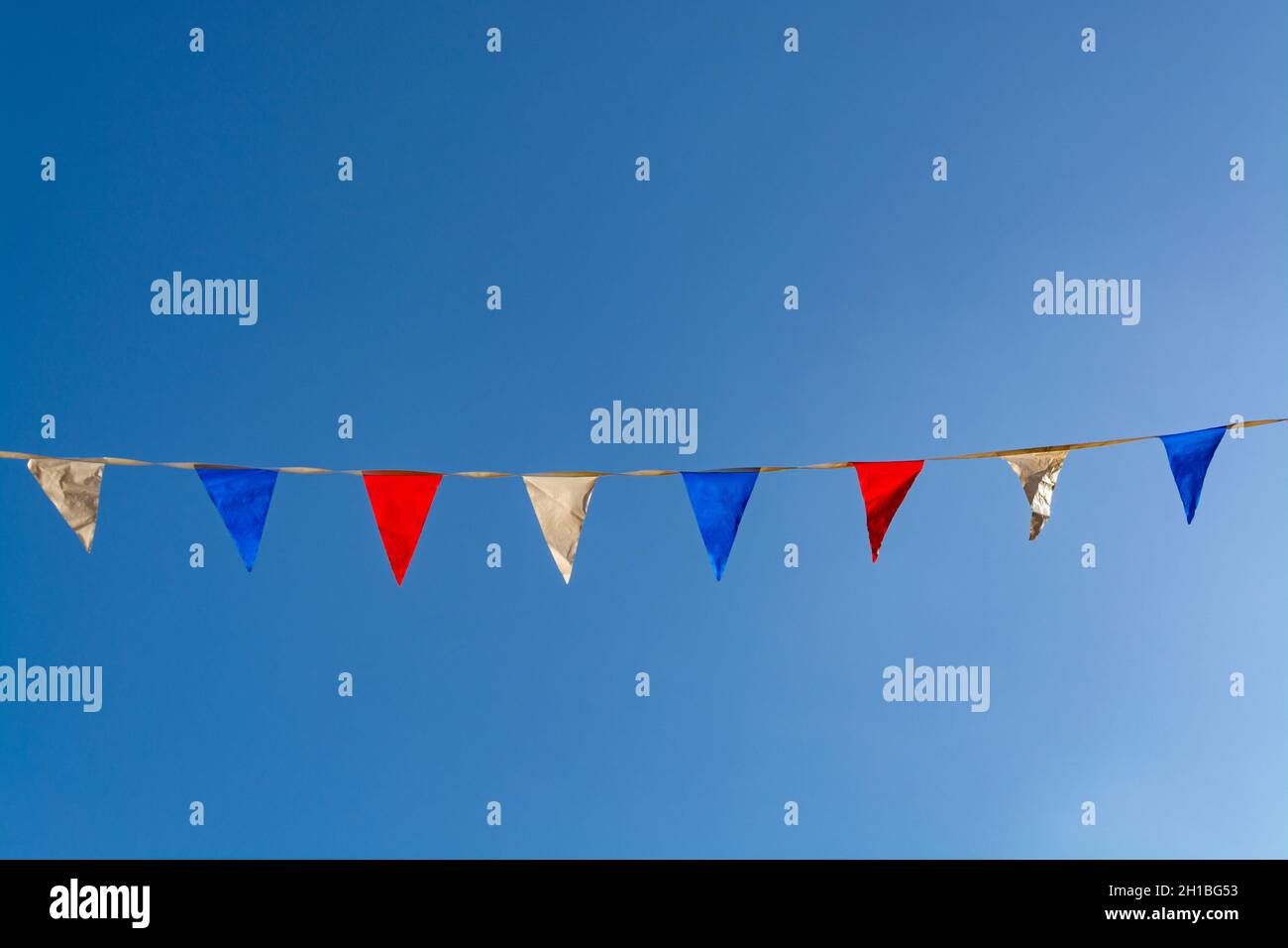 Colorful garland with colors of Dutch flag, white, red and blue in ...