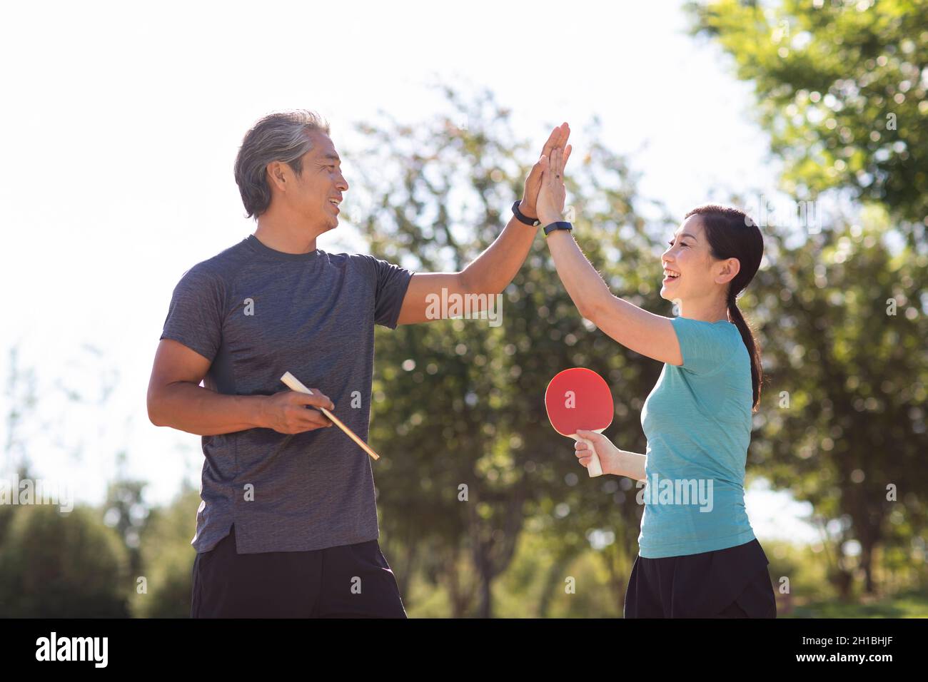 Couple playing table tennis hi-res stock photography and images - Alamy