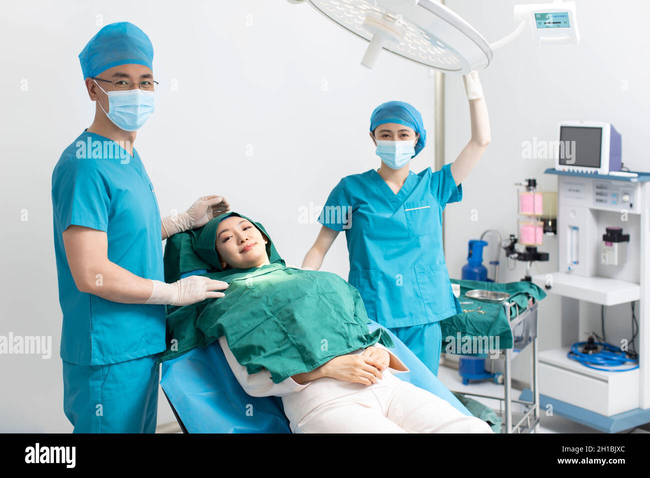 Mid adult woman receiving facial plastic surgery Stock Photo - Alamy
