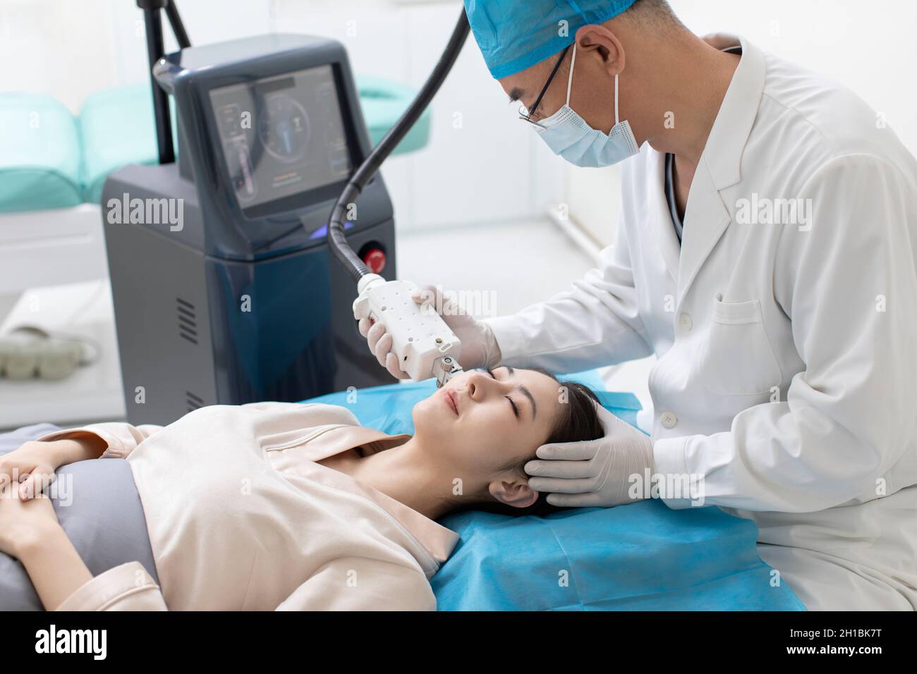 Young woman receiving beauty treatment in hospital Stock Photo - Alamy