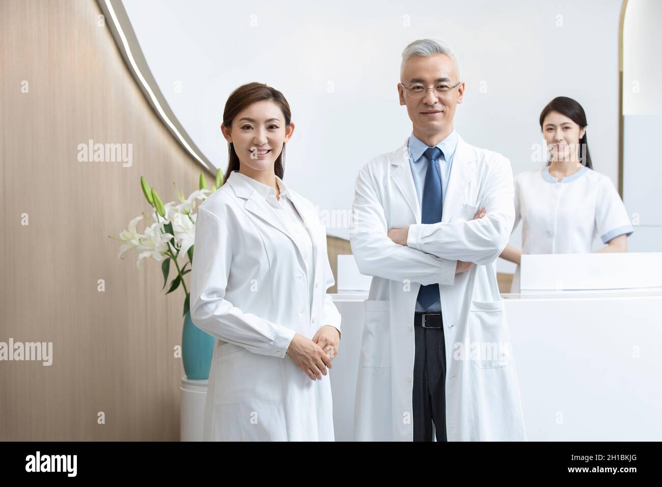Portrait of confident doctors and nurse Stock Photo - Alamy