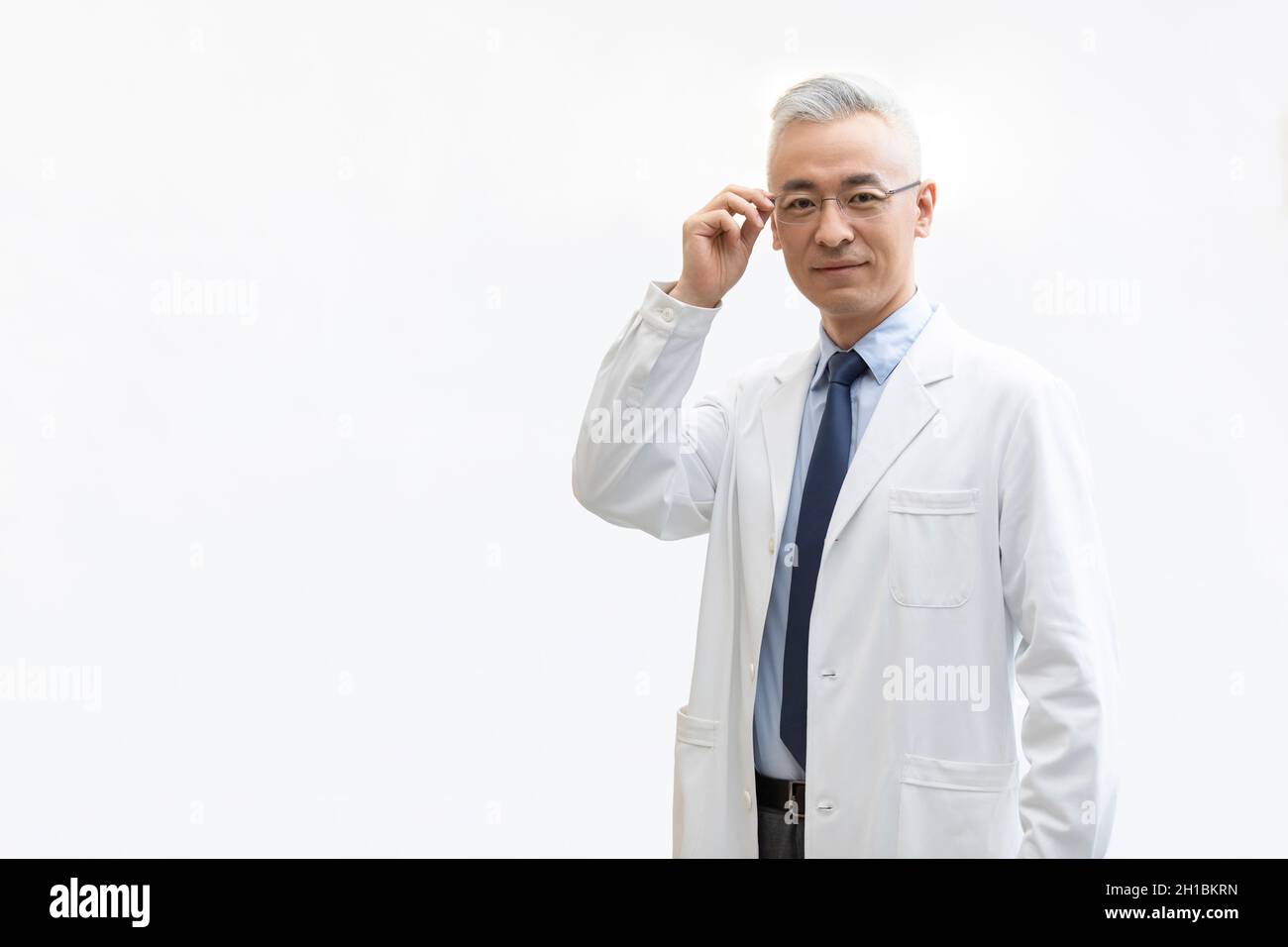 Portrait of confident doctor Stock Photo - Alamy