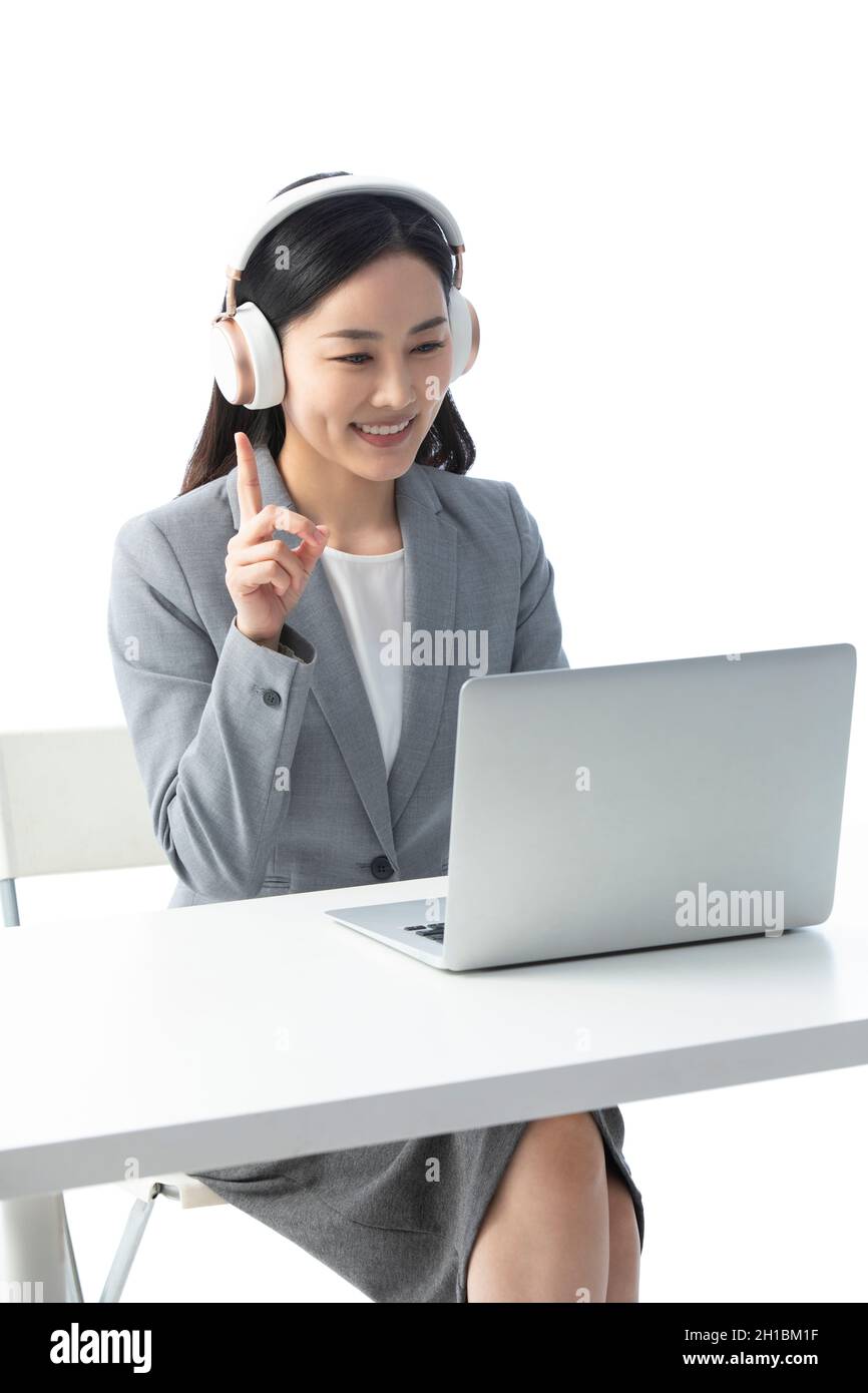 Female teacher working online Stock Photo - Alamy