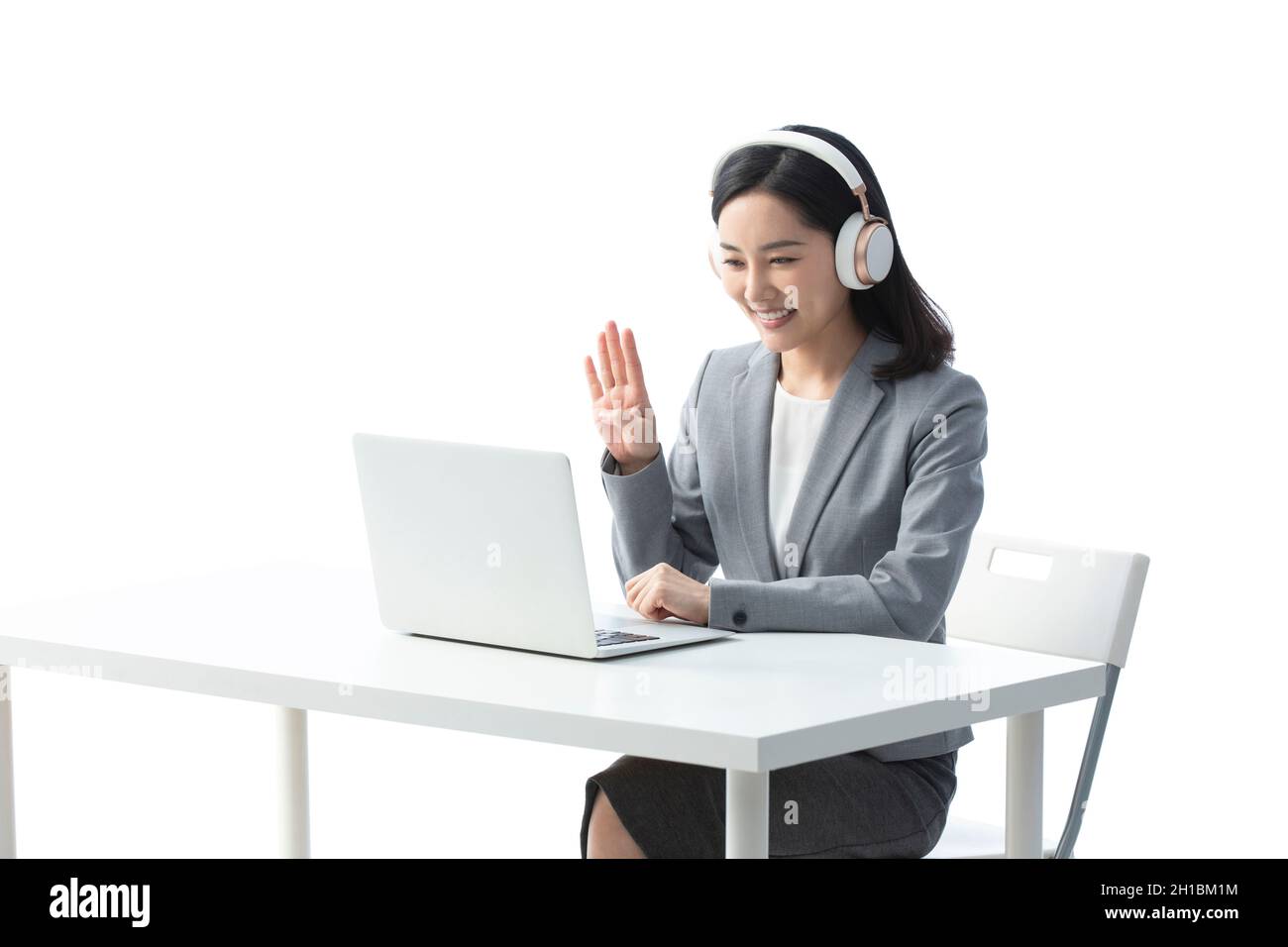 Female teacher working online Stock Photo - Alamy