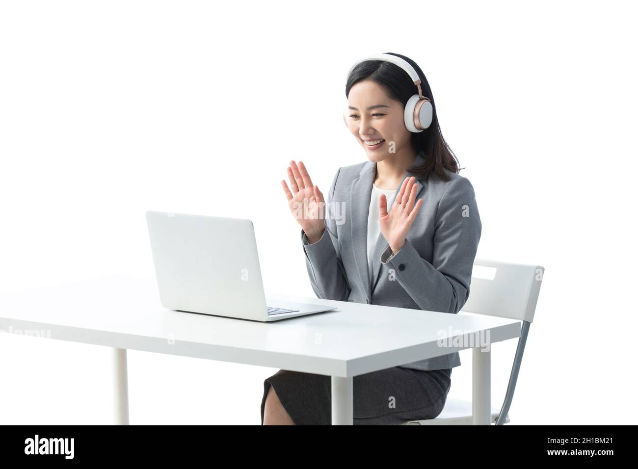 Female teacher working online Stock Photo - Alamy