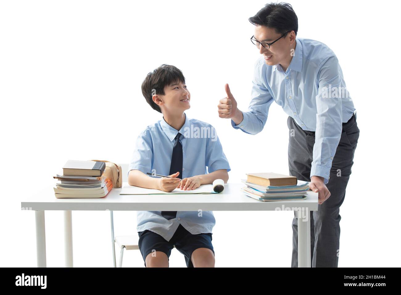 Child thumbs up homework hi-res stock photography and images - Alamy