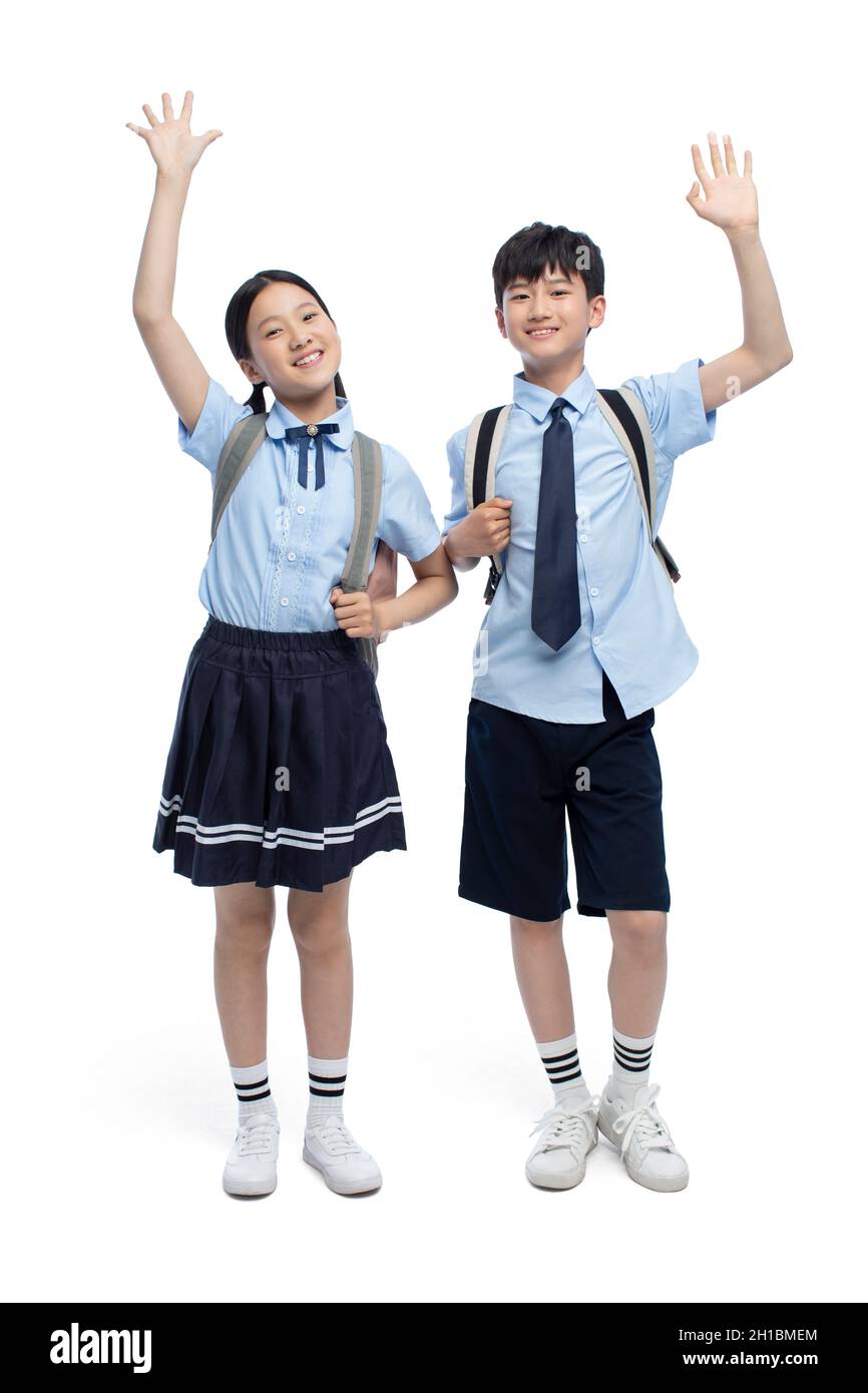 Studio shot of cheerful students waving Stock Photo - Alamy