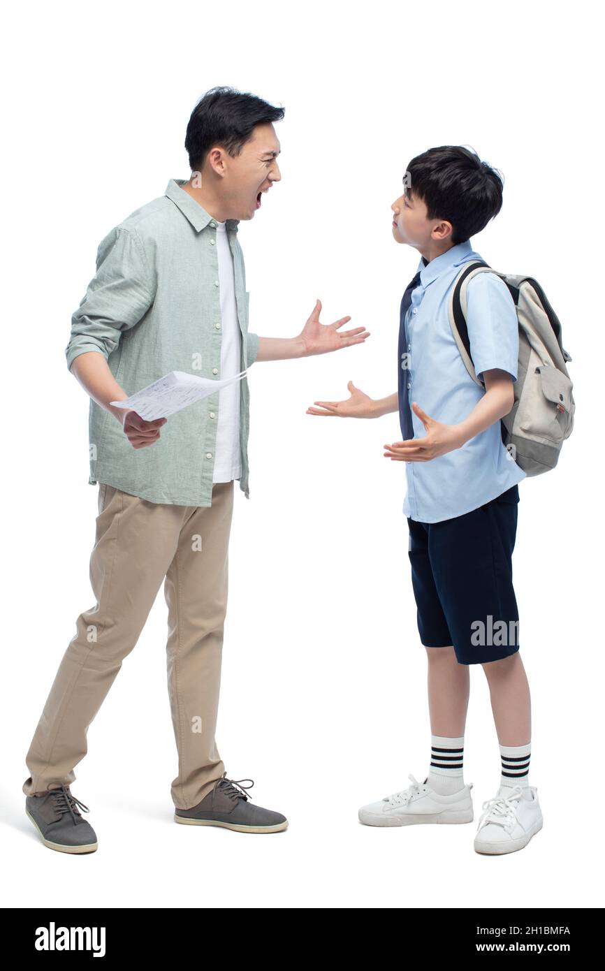 Angry father scolding his son Stock Photo - Alamy