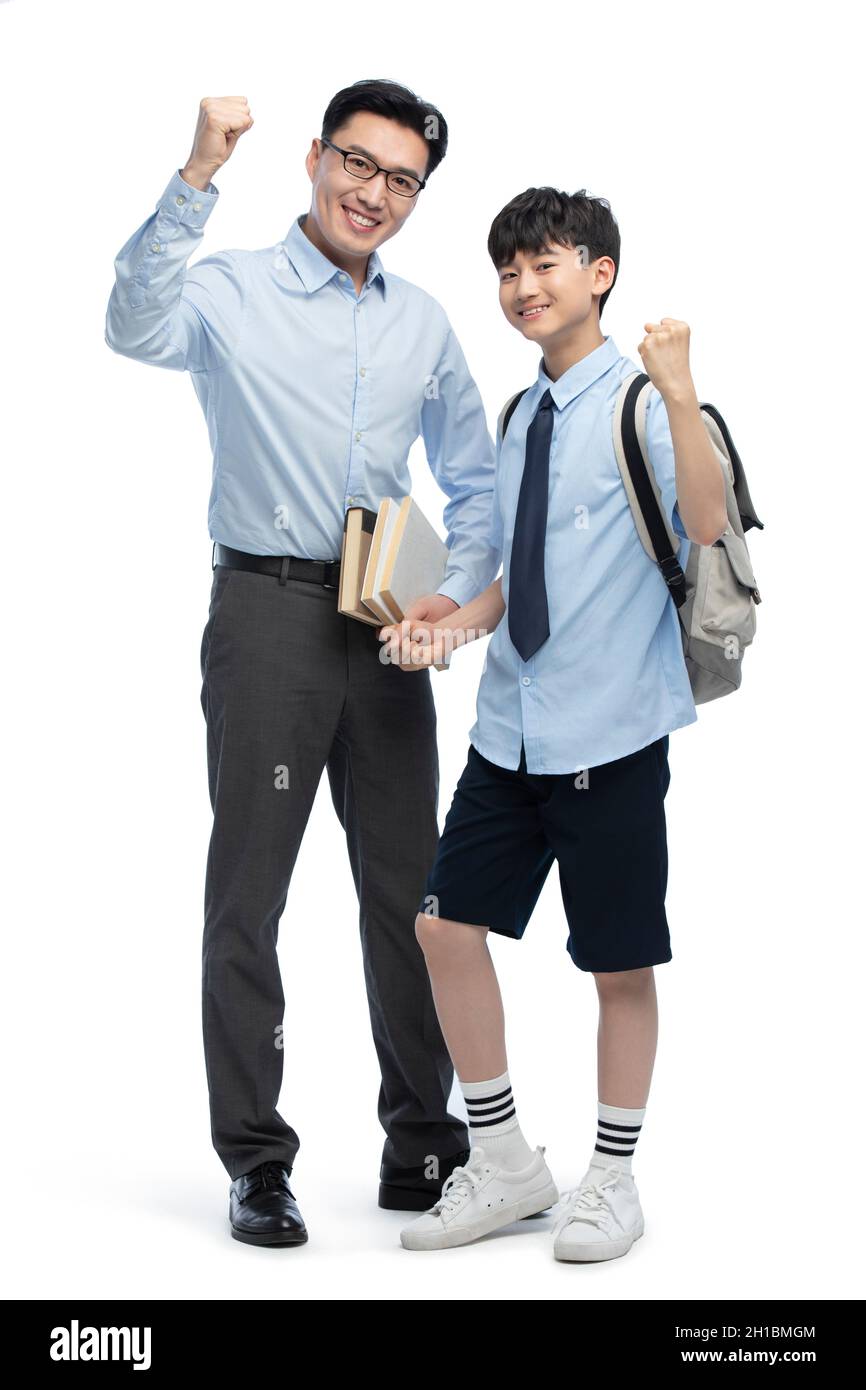 Cheerful teacher and student cheering Stock Photo - Alamy