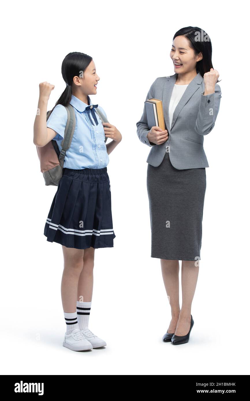 Cheerful teacher and student cheering Stock Photo - Alamy