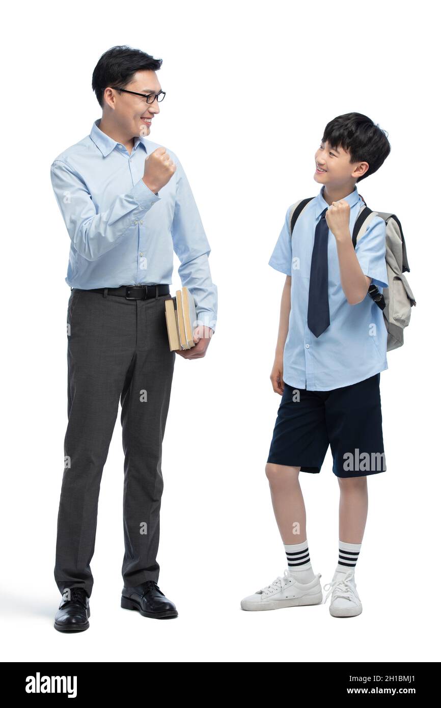 Cheerful teacher and student cheering Stock Photo - Alamy