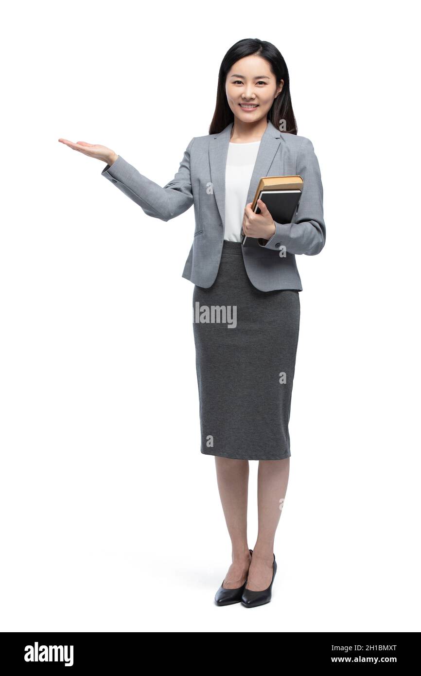 Portrait of smiling female teacher Stock Photo - Alamy