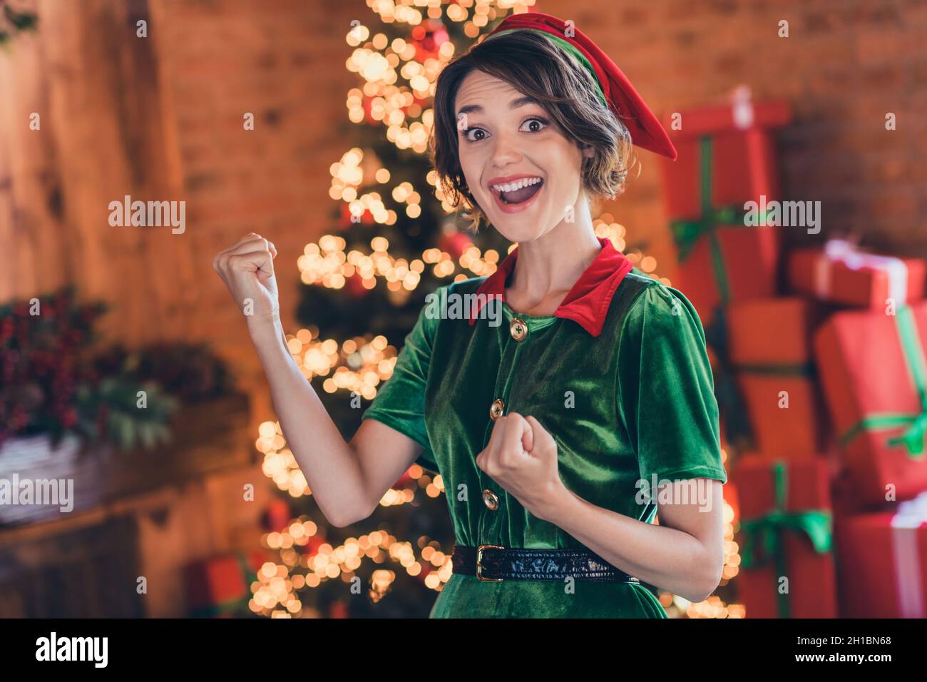 Photo of young cheerful positive happy elf woman smile winner celebrate ...