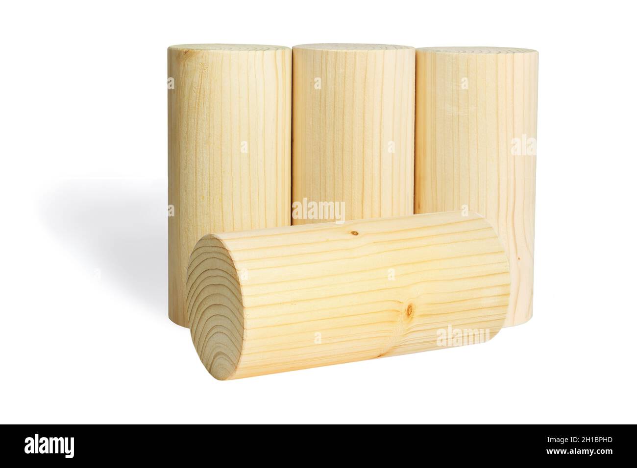 Four Wooden Cylindrical Blocks on White Background Stock Photo - Alamy