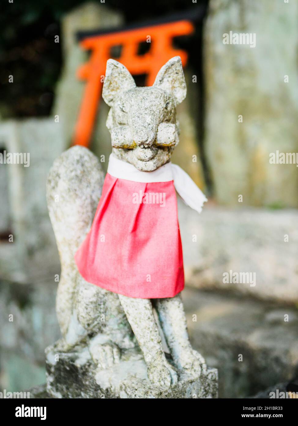 Vertical shot of a detail of the Fushimi Inari head shrine of the kami ...