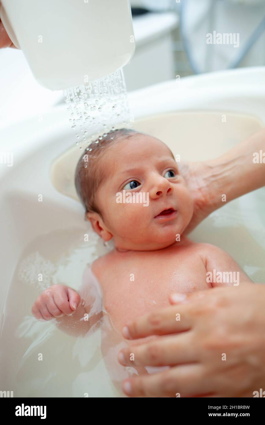 First bath of newborn baby boy. The first bath for a newborn is always ...