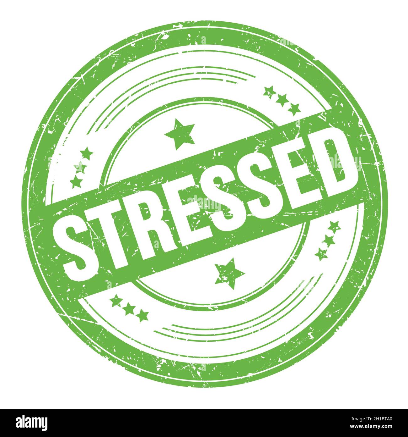 STRESSED text on green round grungy texture stamp Stock Photo - Alamy