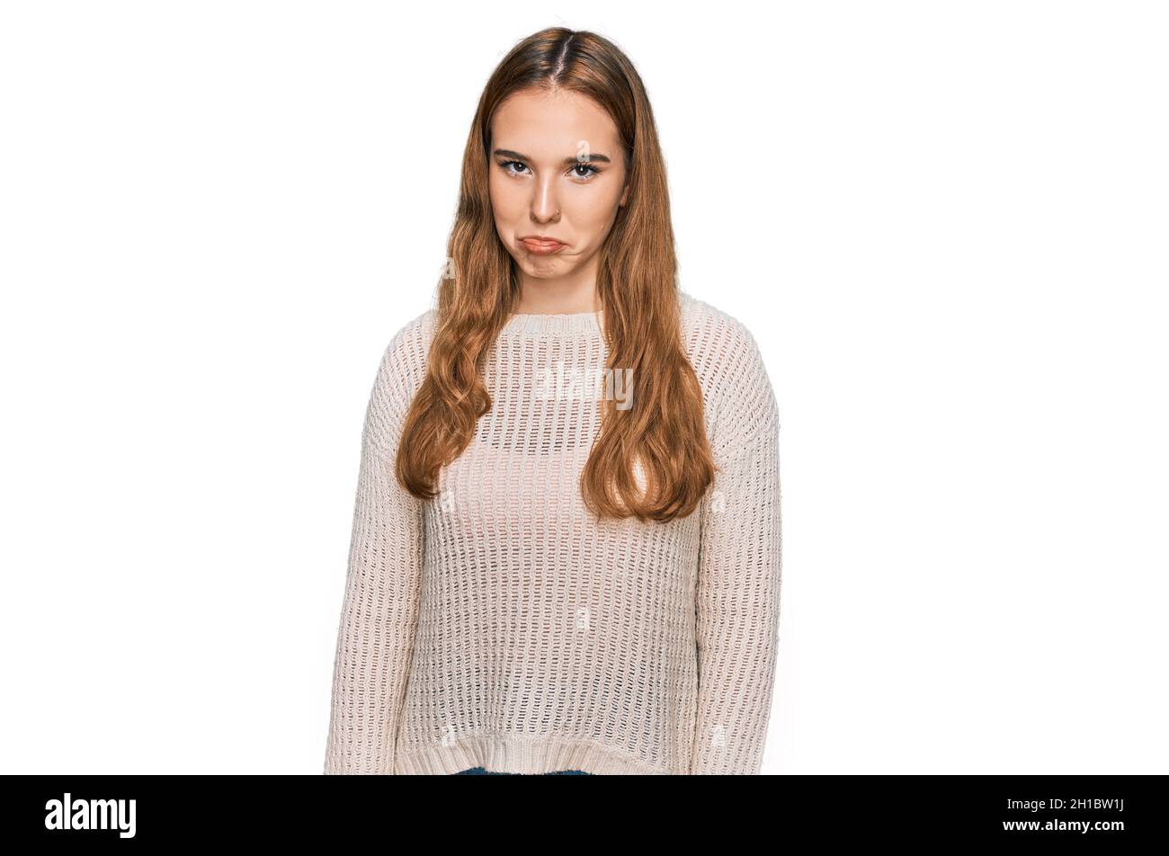 Young blonde woman wearing casual clothes depressed and worry for ...