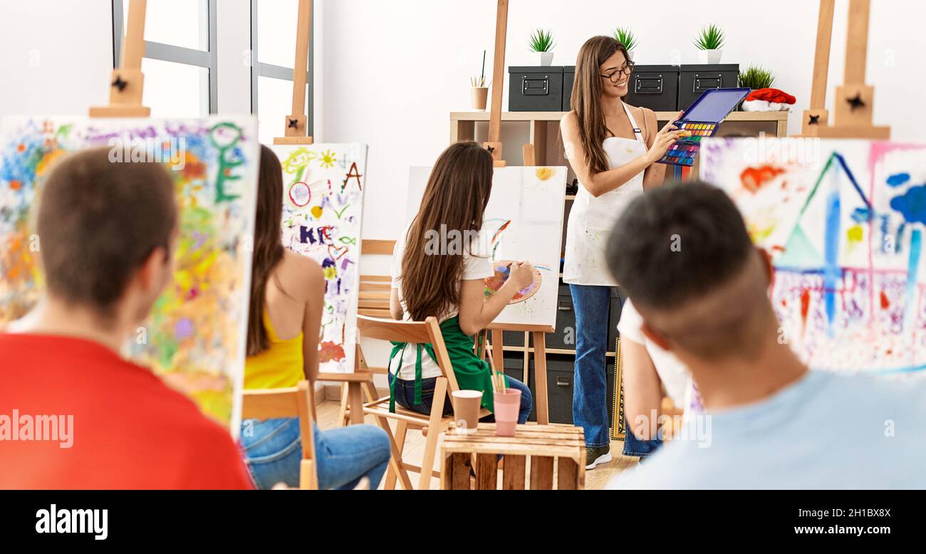 Group of people having paint lesson at art studio Stock Photo - Alamy