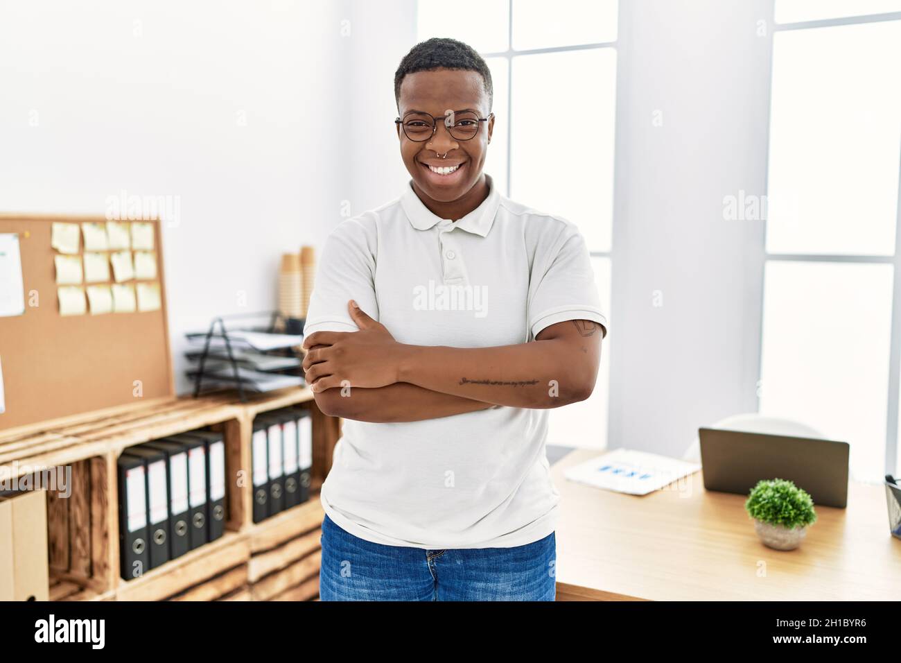 Young african man working at business office Stock Photo - Alamy