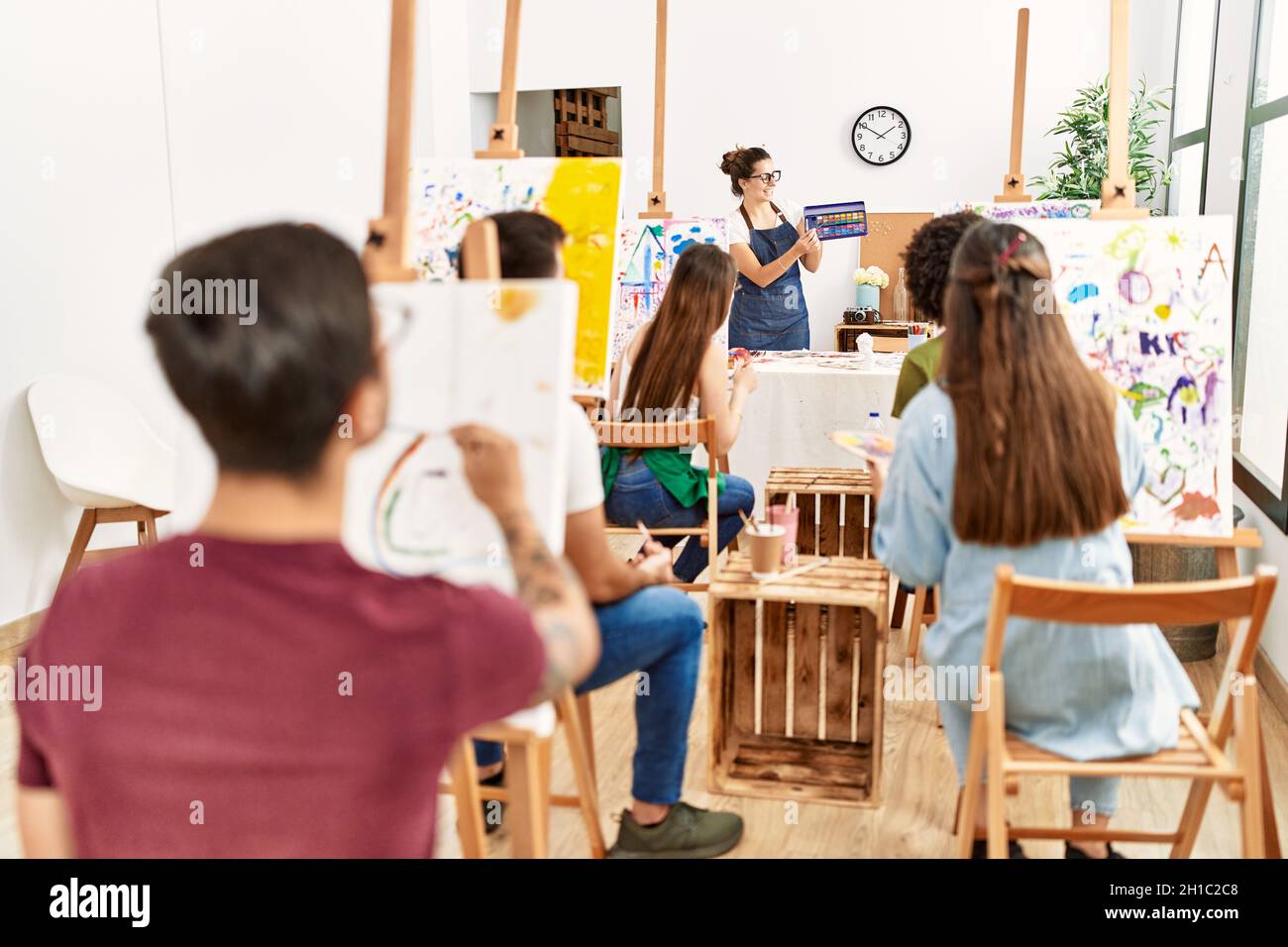 Group of paint students having draw lesson at art studio Stock Photo ...