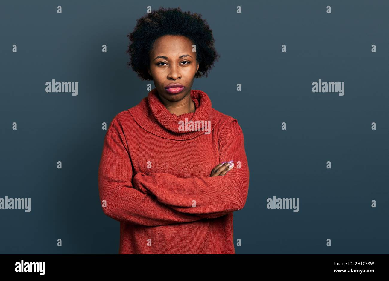 African american woman with afro hair wearing turtleneck sweater ...