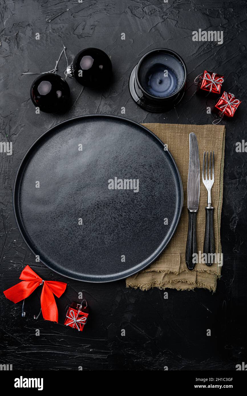 Christmas table setting with empty ceramic plate set, top view flat lay ...