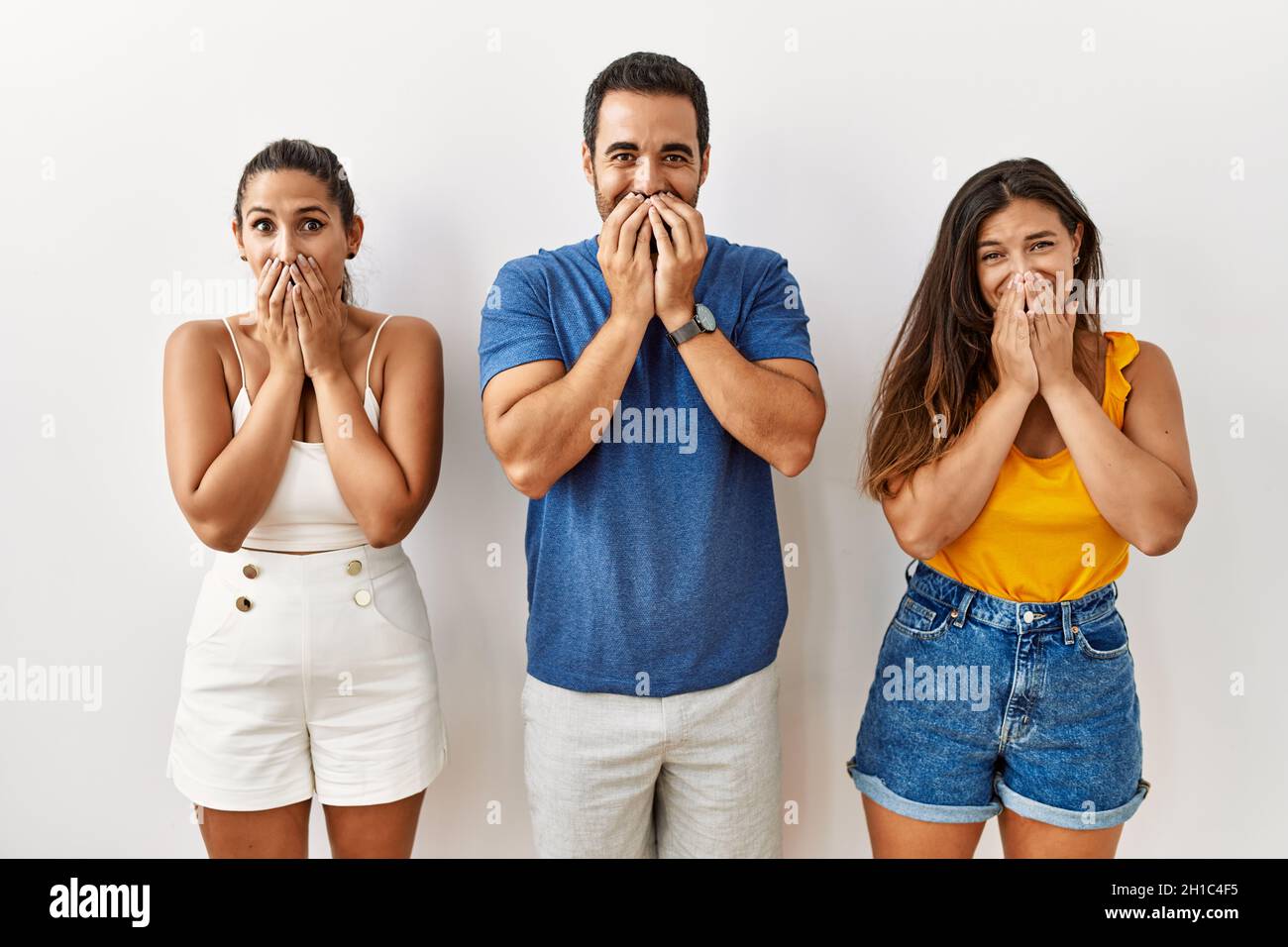 Group of young hispanic people standing over isolated background ...