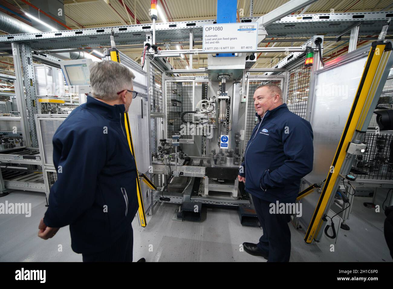 Stuart Rowley president, Ford of Europe (left) talks with plant manager ...