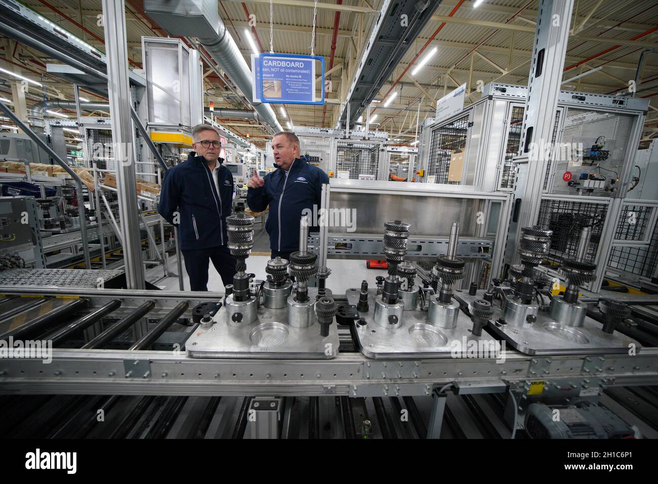 Stuart Rowley president, Ford of Europe (left) talks with plant manager ...