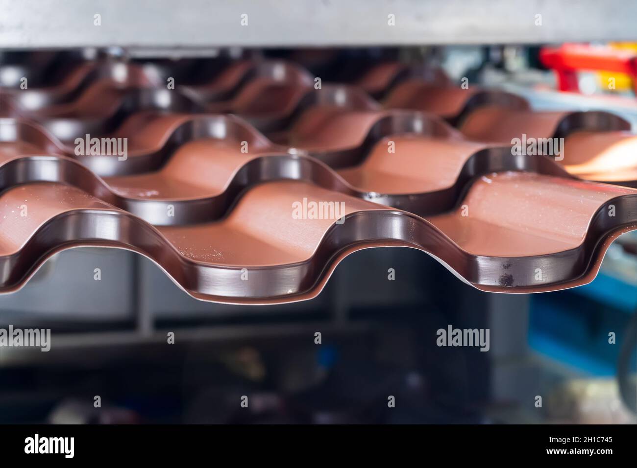 Process of forming Metal Tile close up in metalforming machine Stock ...