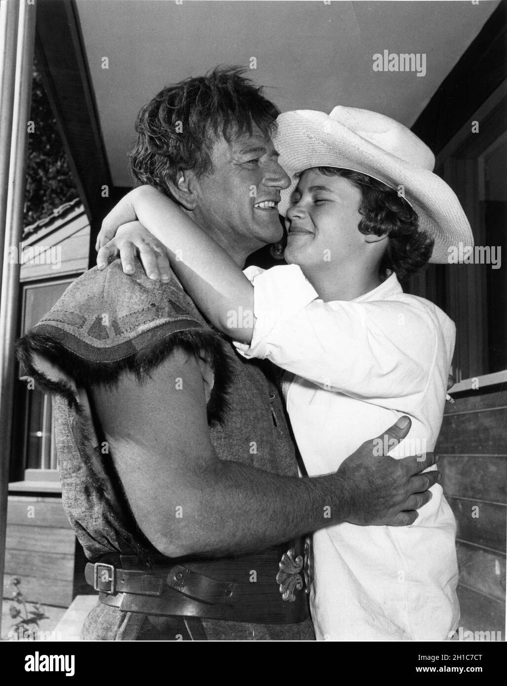 JOHN WAYNE in costume as Mongol Chief Tomujin / Genghis Khan with his ...