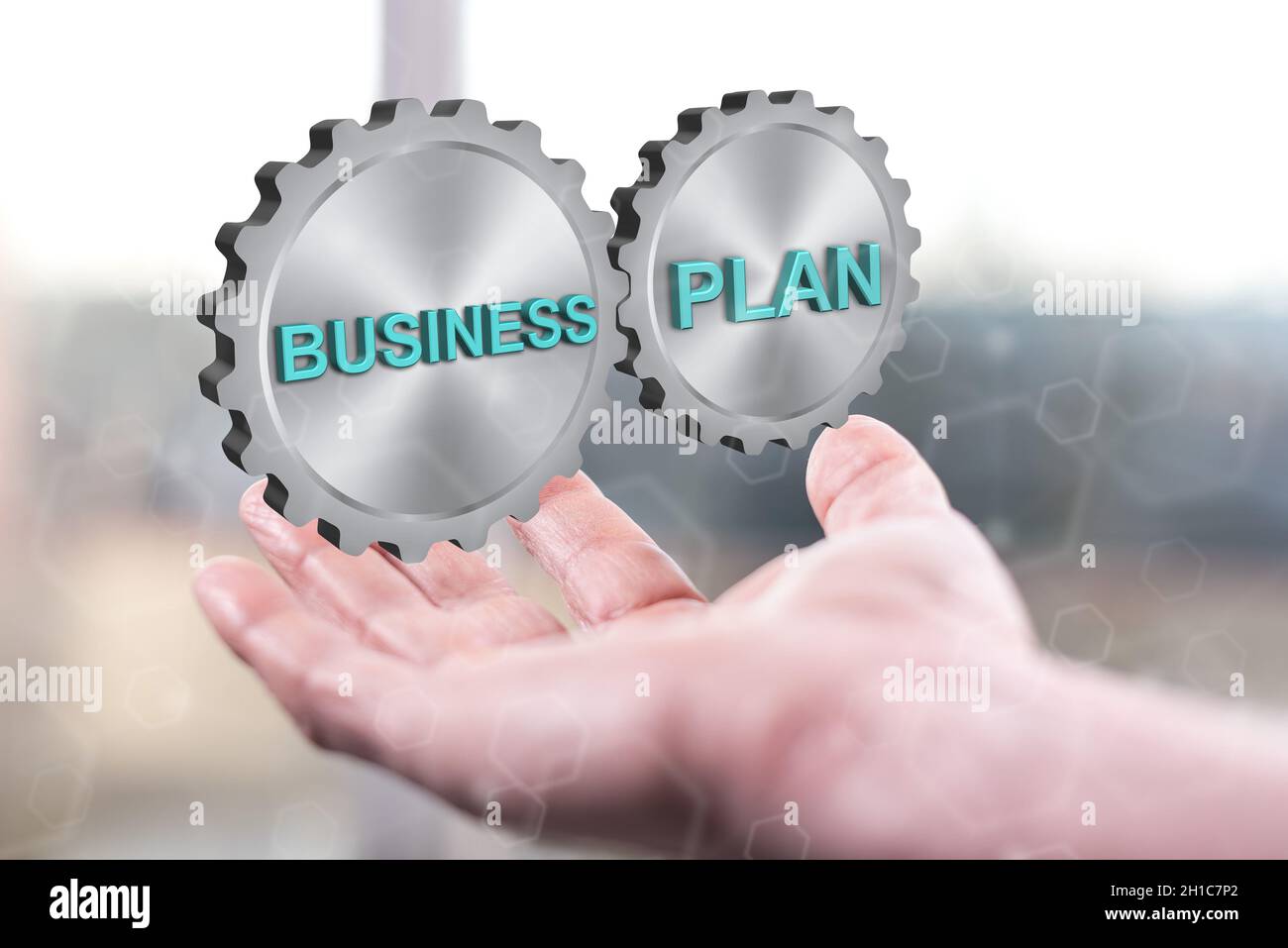 Business plan concept above a hand of a man Stock Photo - Alamy