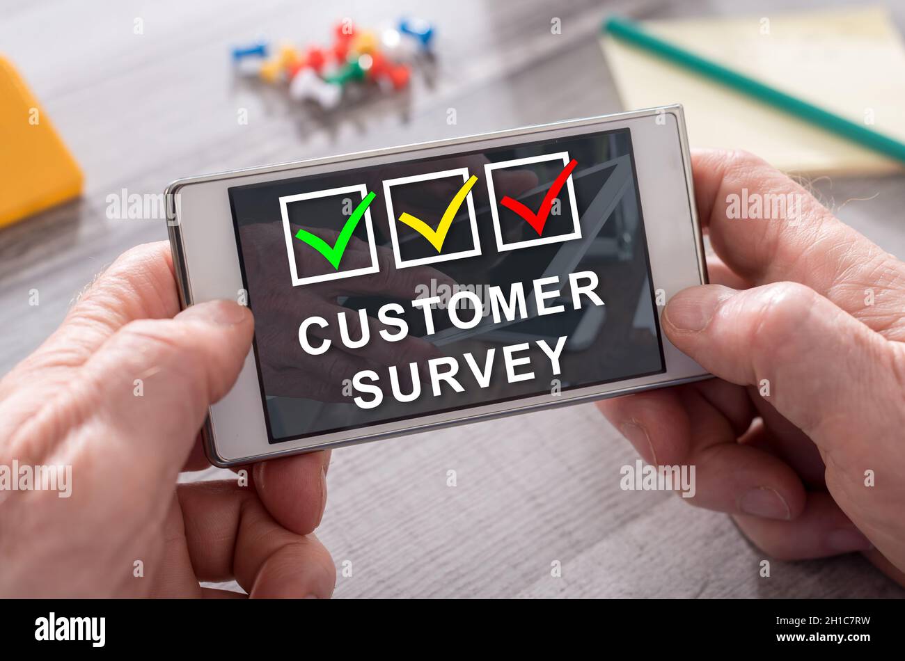 Customer survey concept on mobile phone Stock Photo - Alamy