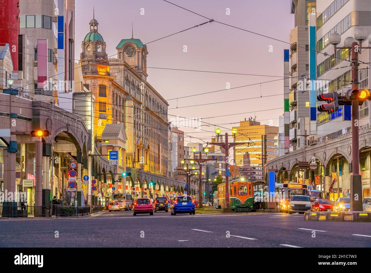 Kagoshima city downtown center, cityscape in Kyushu, Japan at sunset ...
